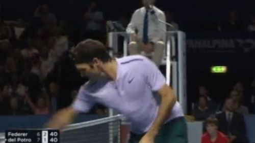 Roger Federer smashes racquet into net in anger in Swiss Indoors final